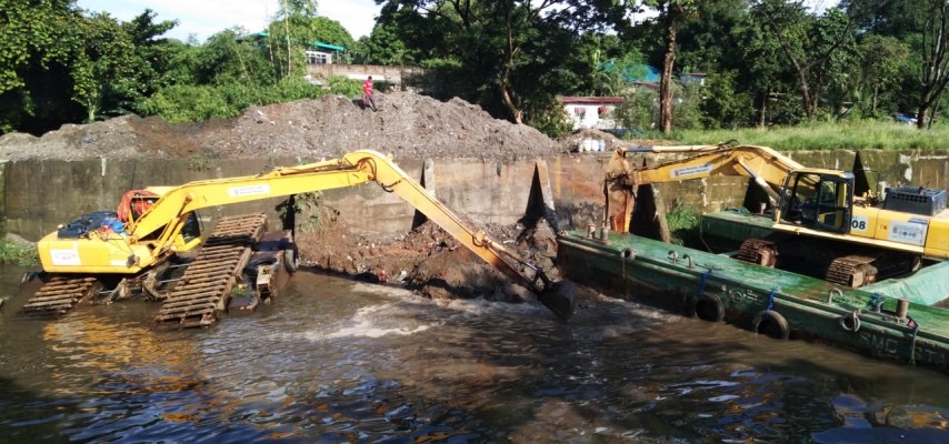 SMC completes Tullahan River cleanup; 1.12 million tons of waste ...